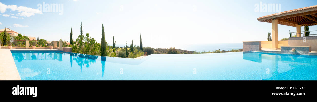 Sea view luxury swimming pool. Panoramic image Stock Photo - Alamy