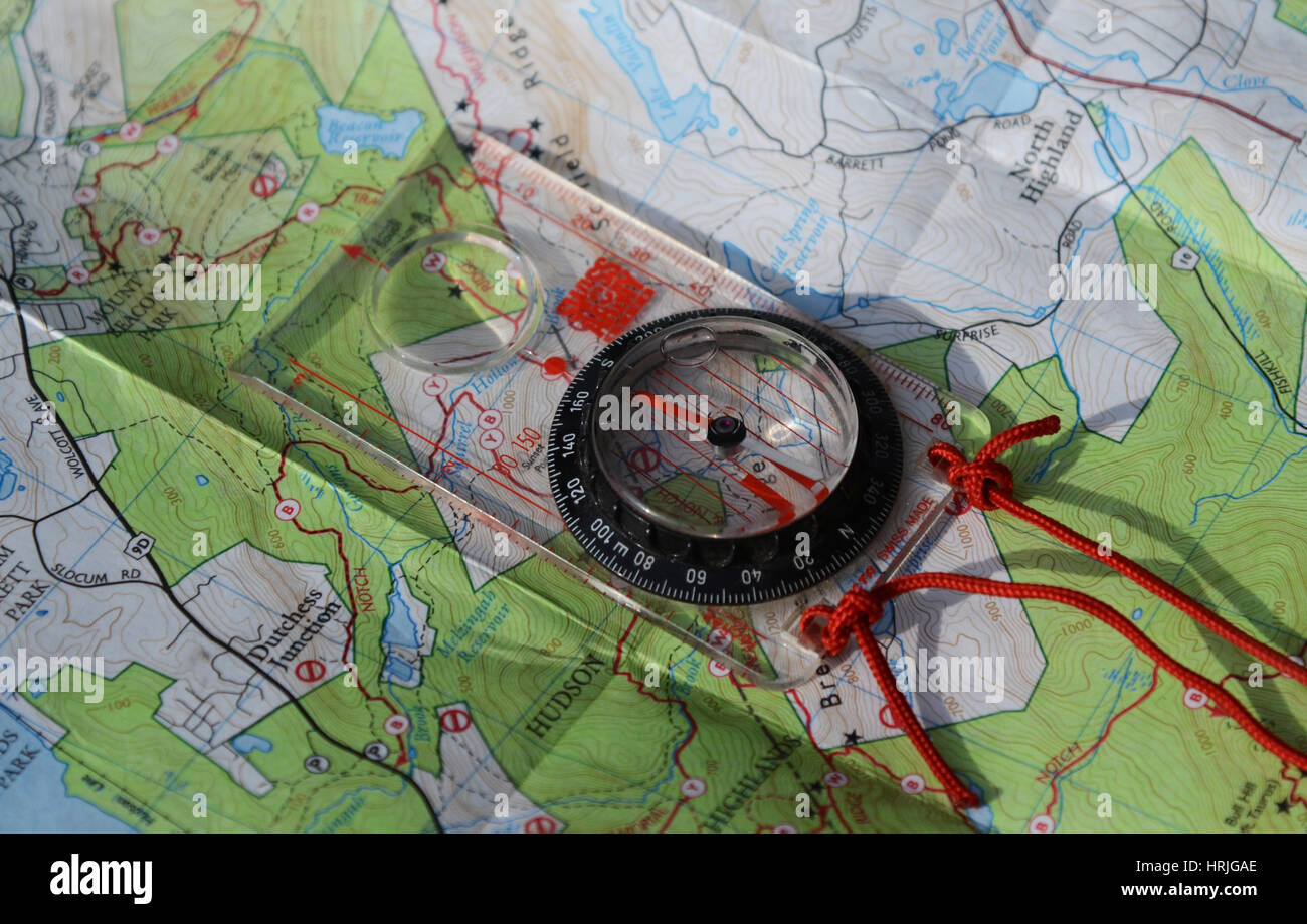 Compass and Map Stock Photo - Alamy