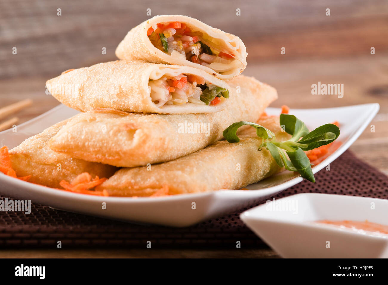 Vegetable spring rolls Stock Photo - Alamy