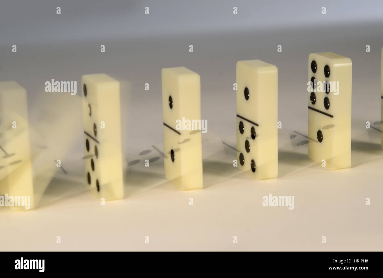 Cause and effect domino hi-res stock photography and images - Alamy