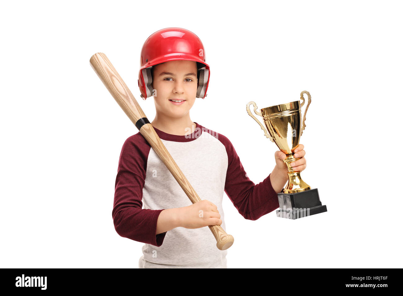 Little boy with a baseball bat and a golden trophy isolated on white ...