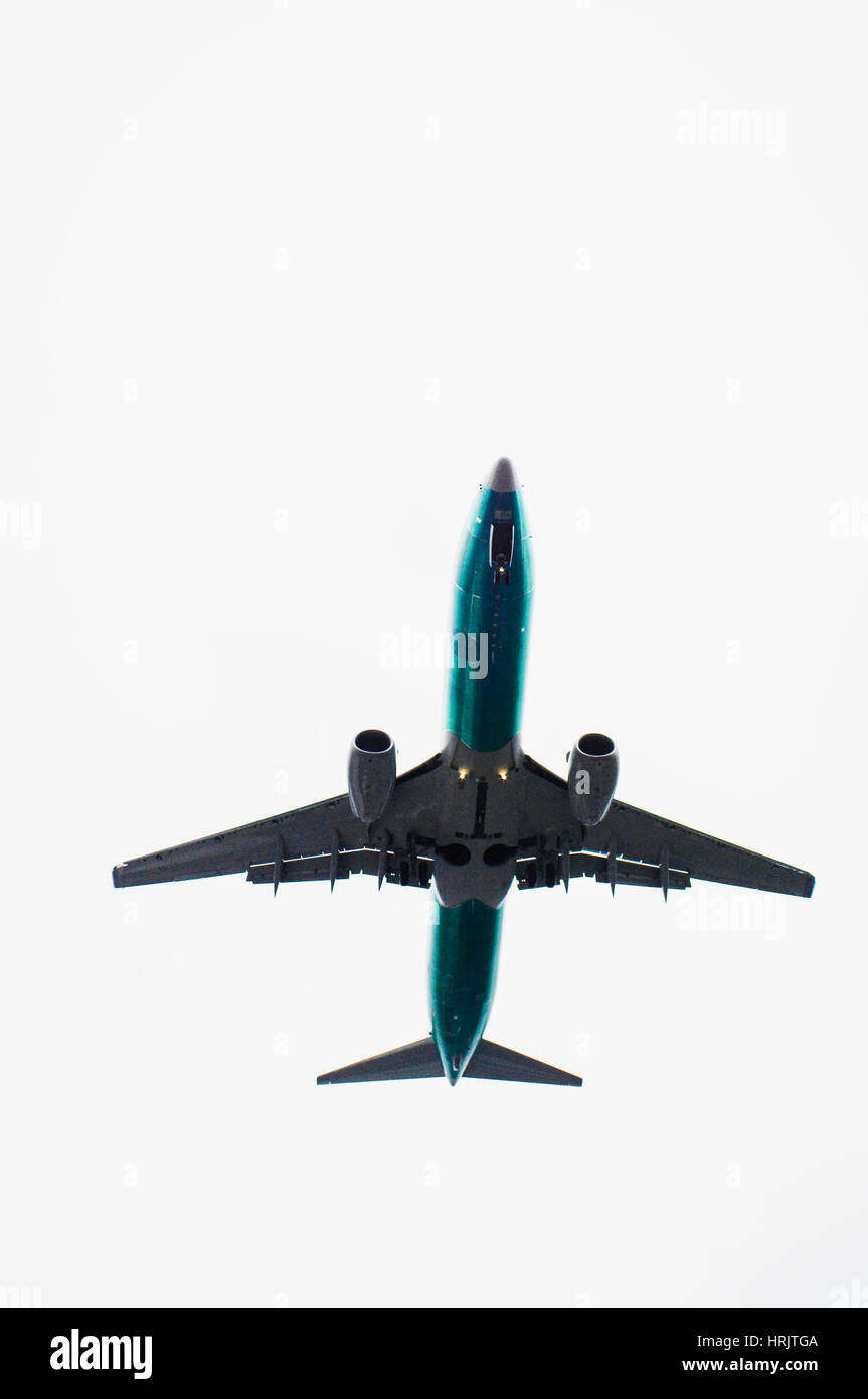 The underside of a aeroplane in flight Stock Photo - Alamy