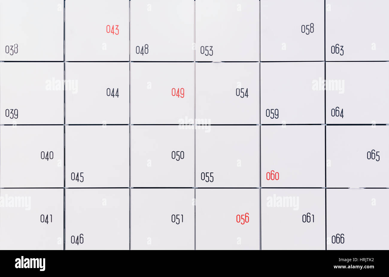 Black and red numbers in different positions on a white grid Stock ...