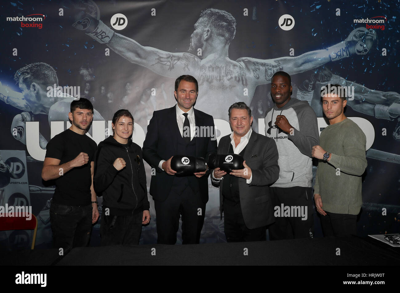 Boxing promoter Eddie Hearn (centre left) and JD Sports representative ...