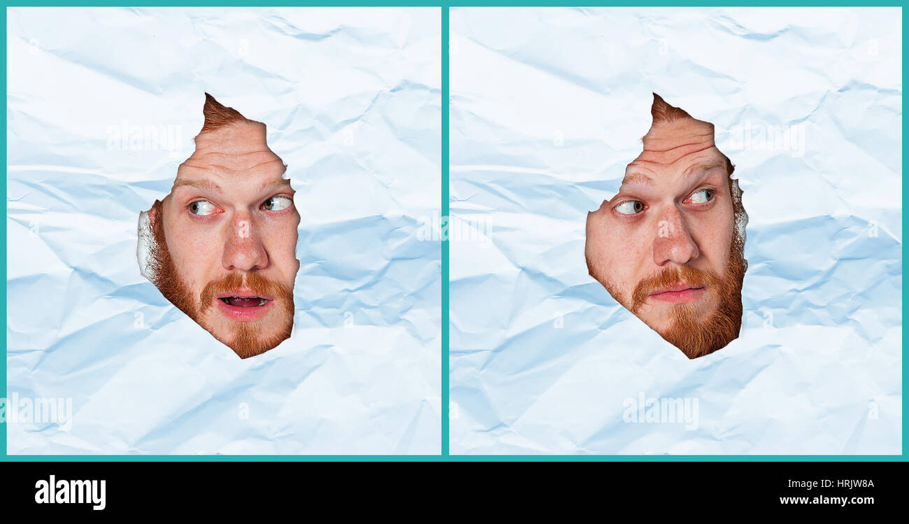 Man looking through ripped paper hole hi-res stock photography and ...