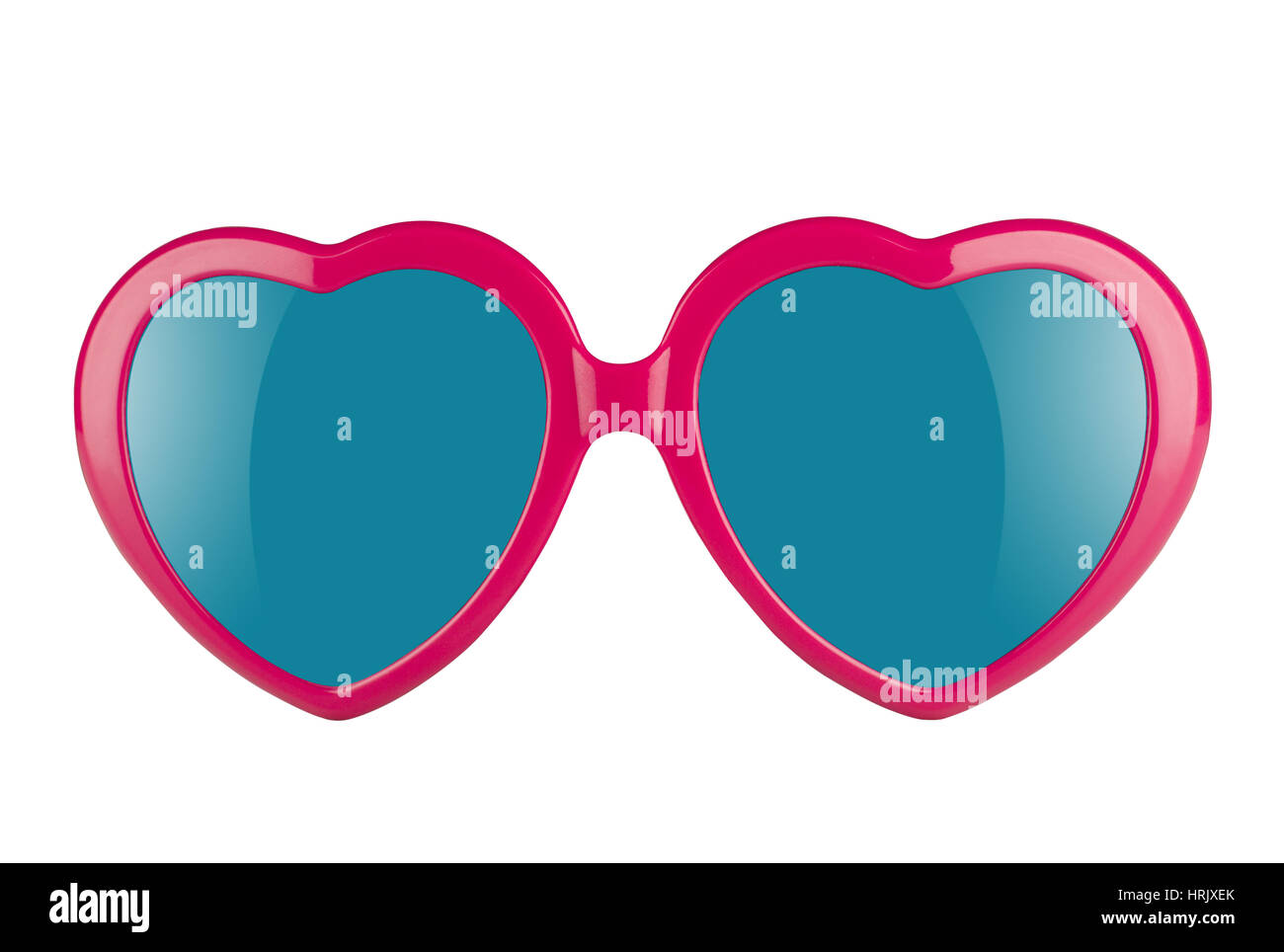A pair of pink heart shaped sun glasses with blue lenses isolated on ...