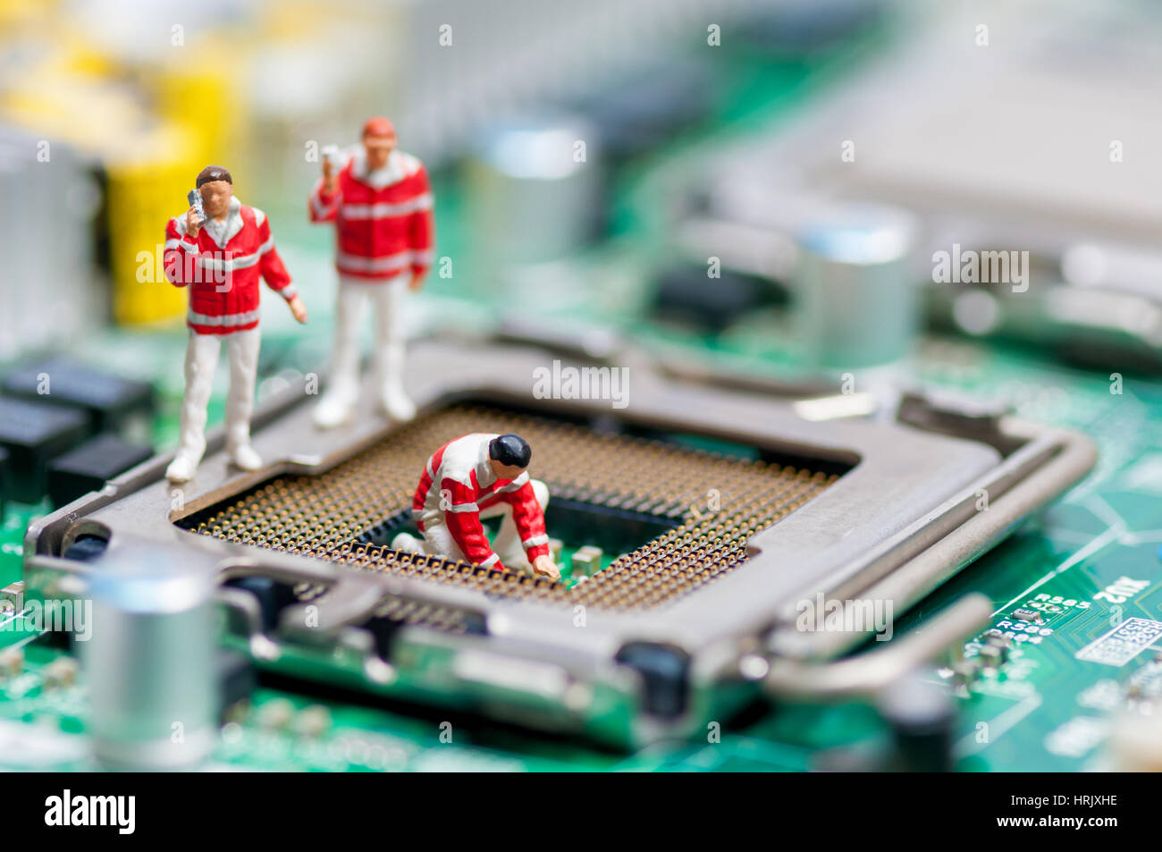 Group of paramedics recovering damaged CPU. Technology concept Stock ...