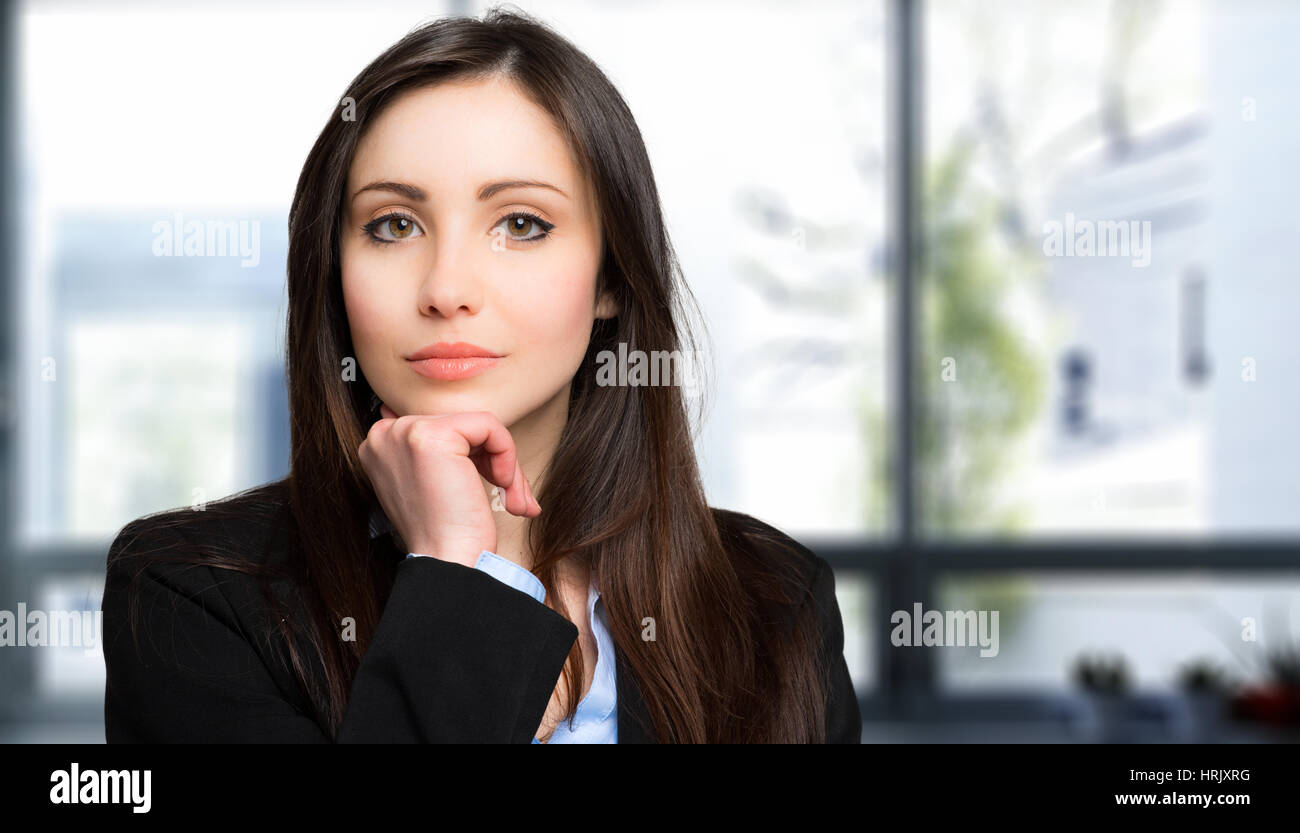 Smiling young female manager portrait Stock Photo - Alamy