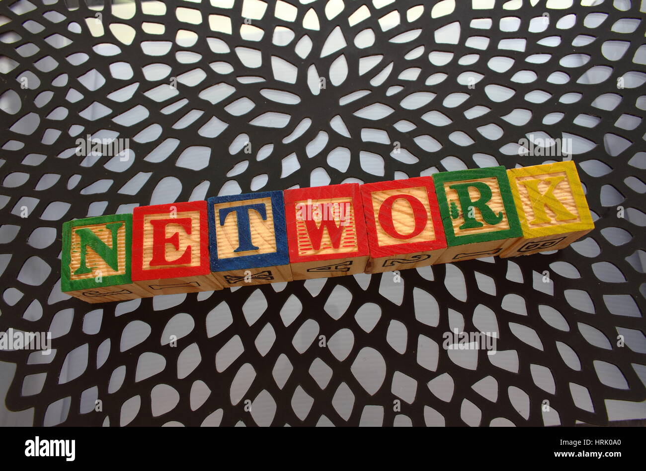 The business term network displayed on a background shaped like a net ...