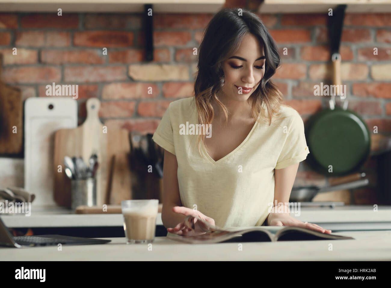 Lovely girl in the kitchen Stock Photo - Alamy