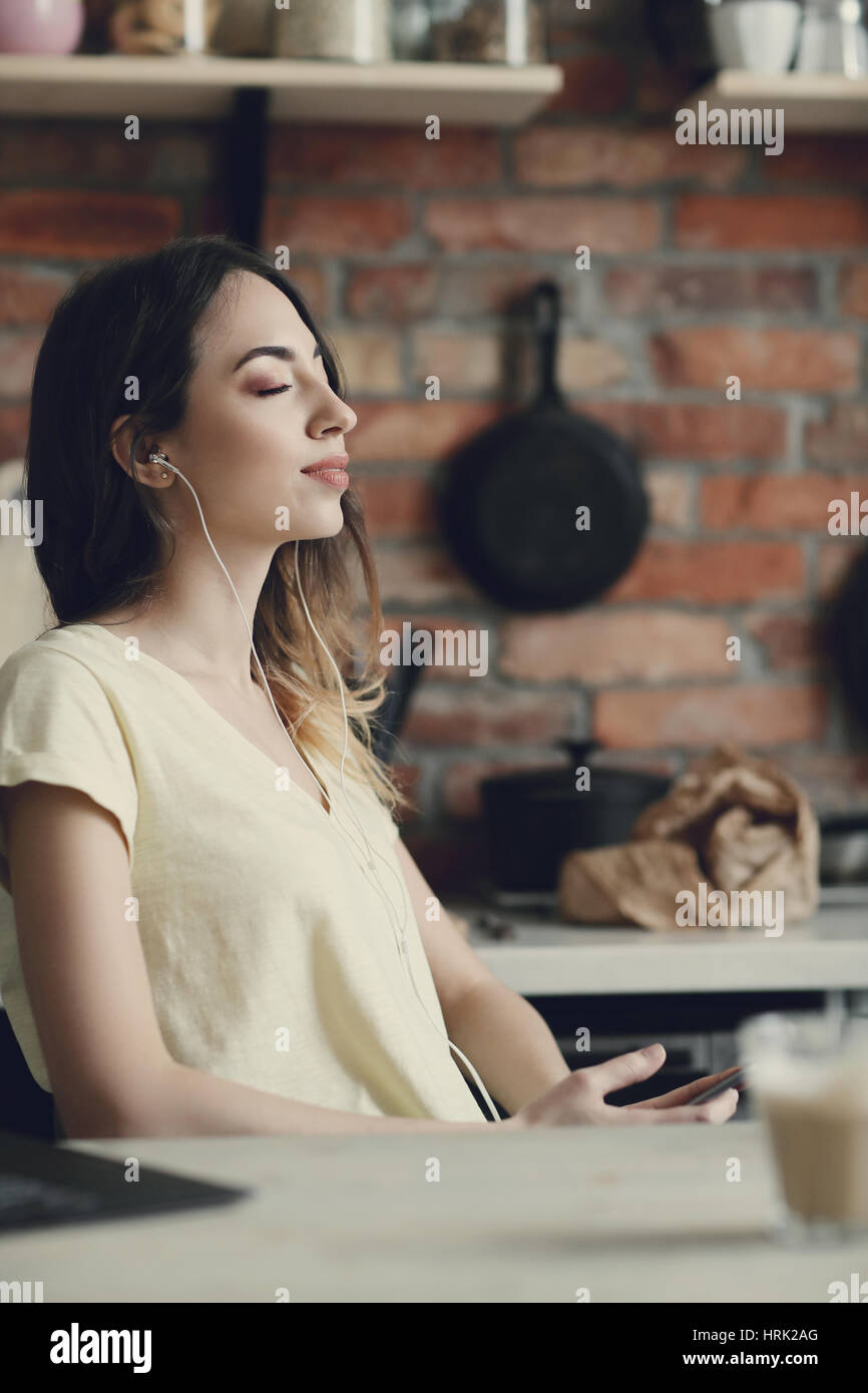 Lovely girl in the kitchen Stock Photo - Alamy