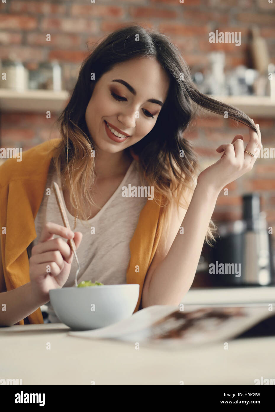 Lovely girl in the kitchen Stock Photo - Alamy