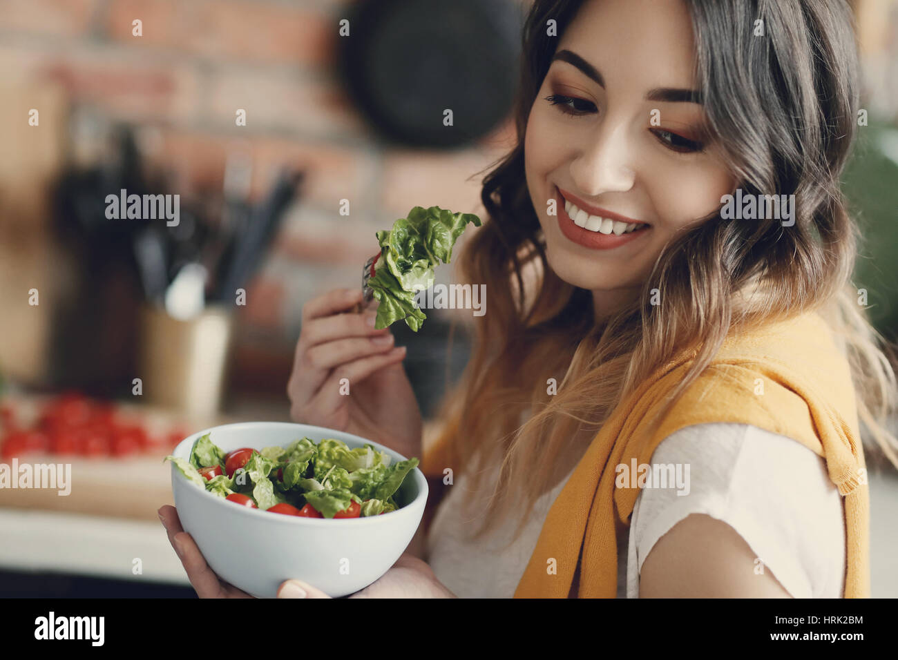 Lovely girl in the kitchen Stock Photo - Alamy