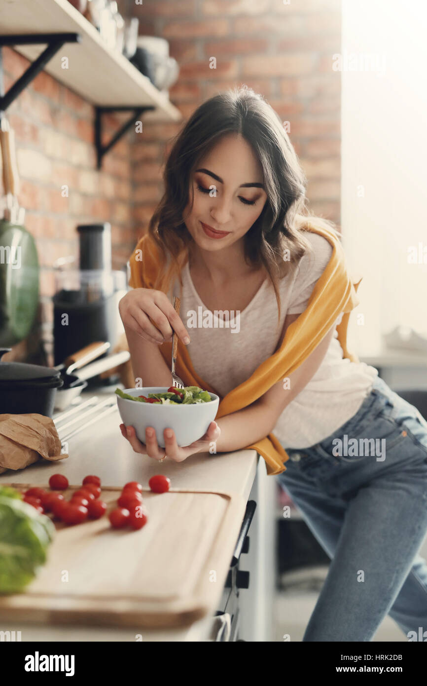 Lovely girl in the kitchen Stock Photo - Alamy