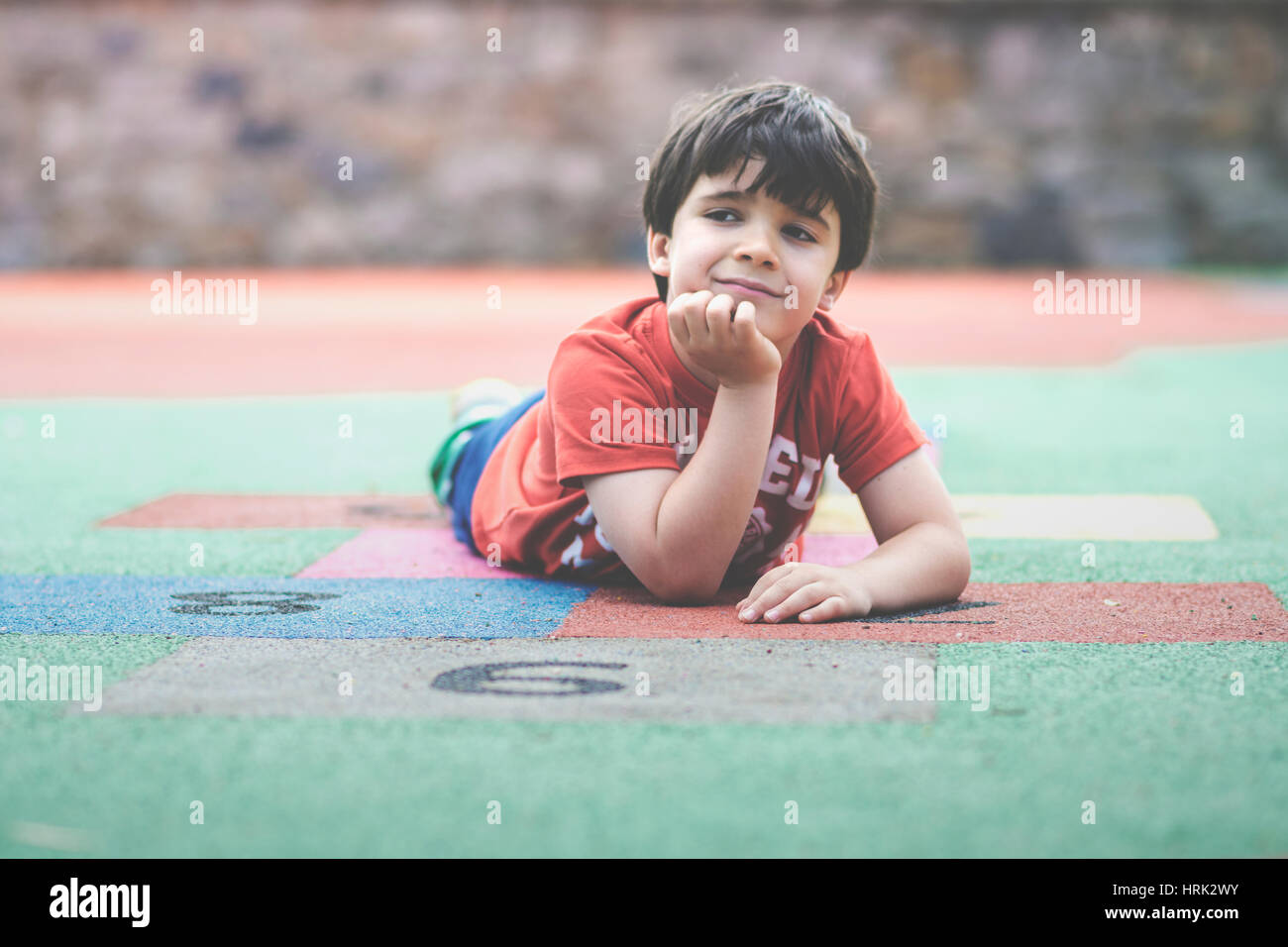 Happy child in playground Stock Photo - Alamy