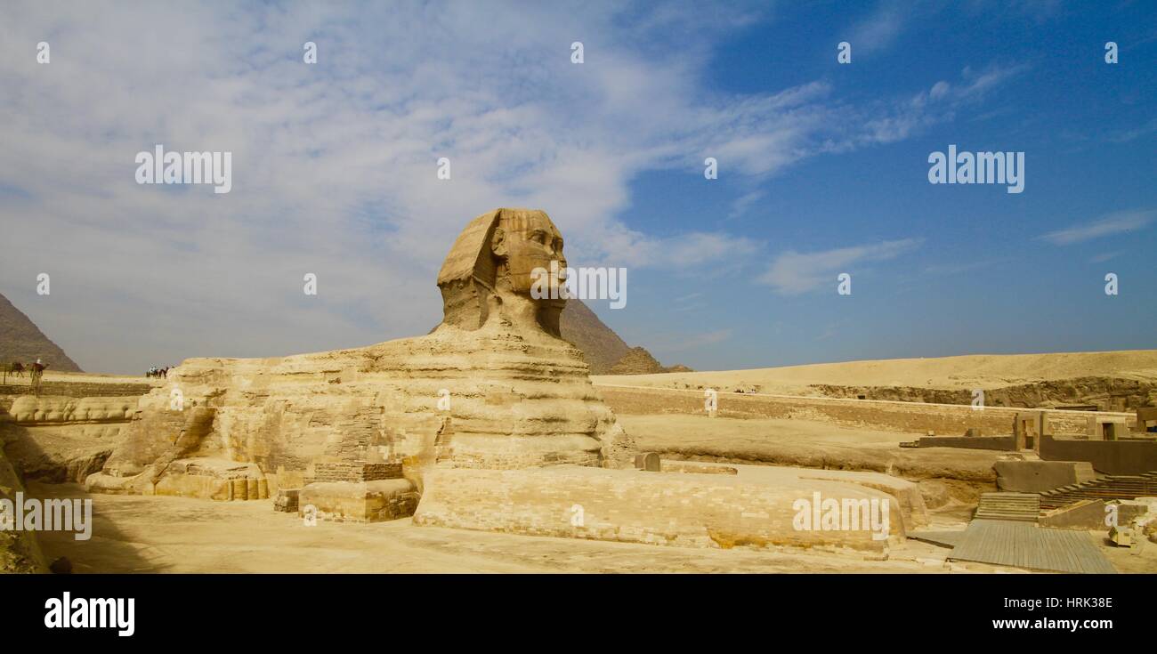 Great Sphinx of Giza under a beautiful blue sky Stock Photo - Alamy