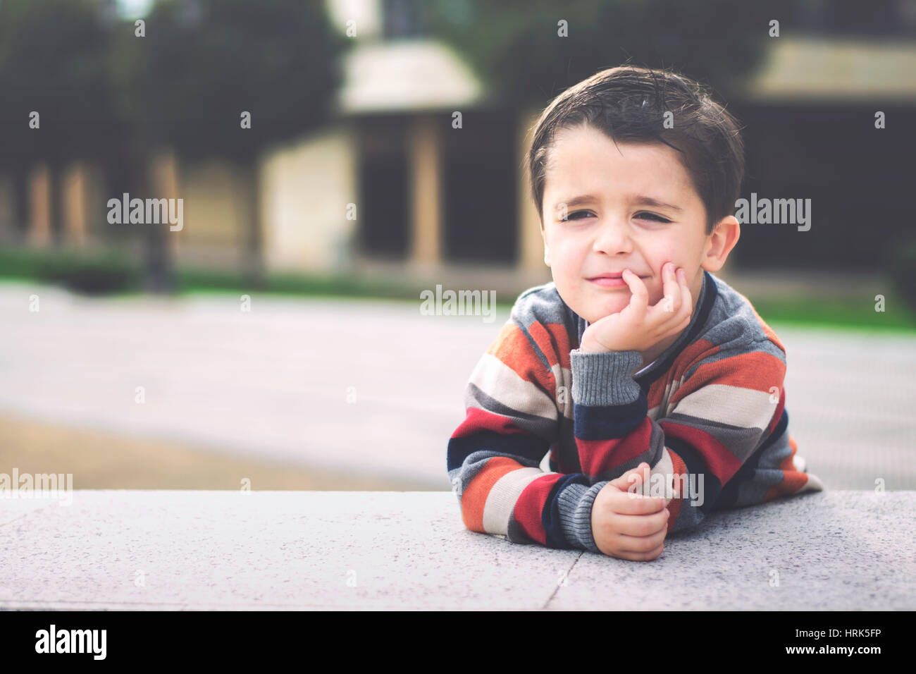Happy child in playground Stock Photo - Alamy