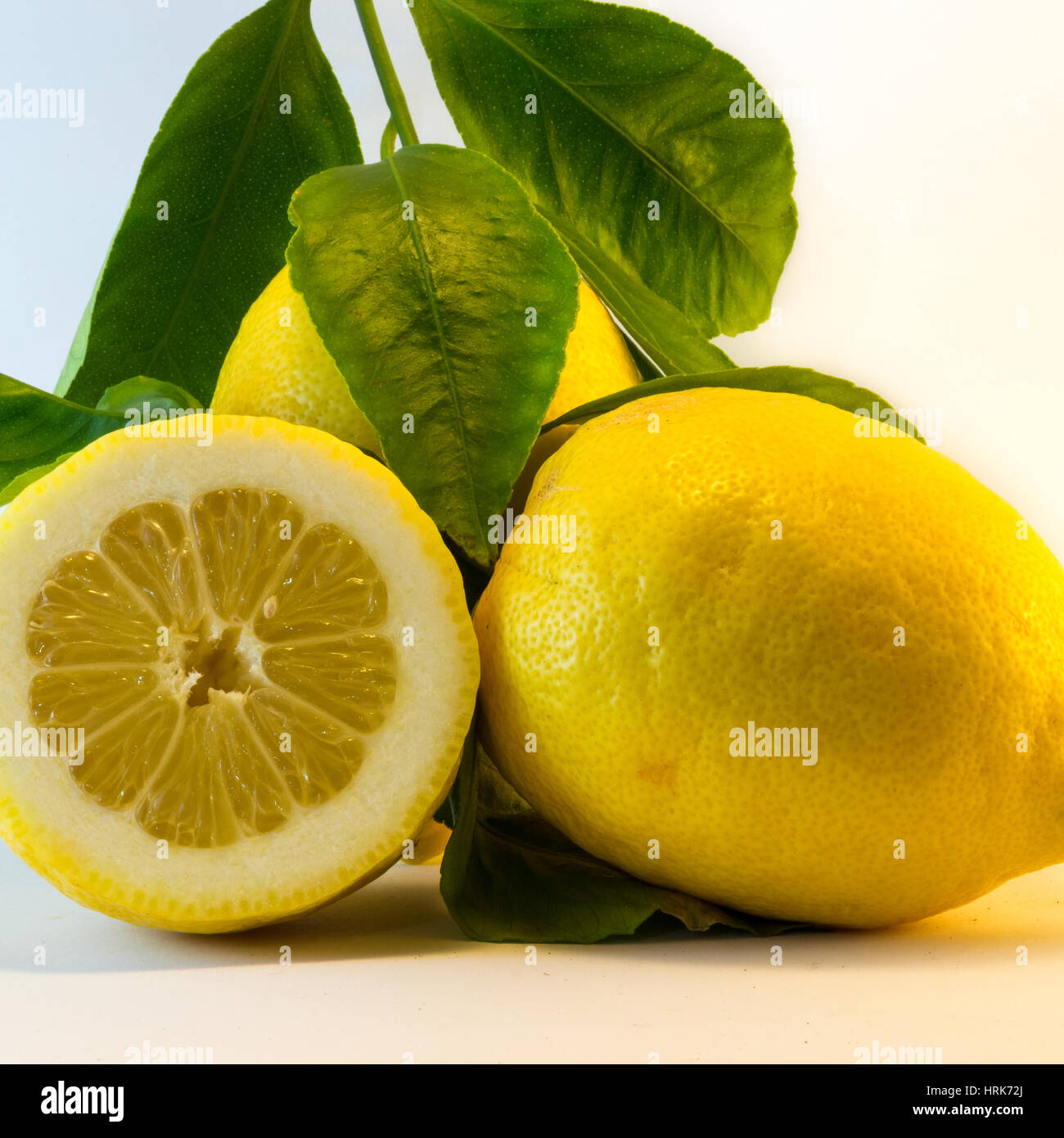 Three Fresh lemon over white background Stock Photo - Alamy
