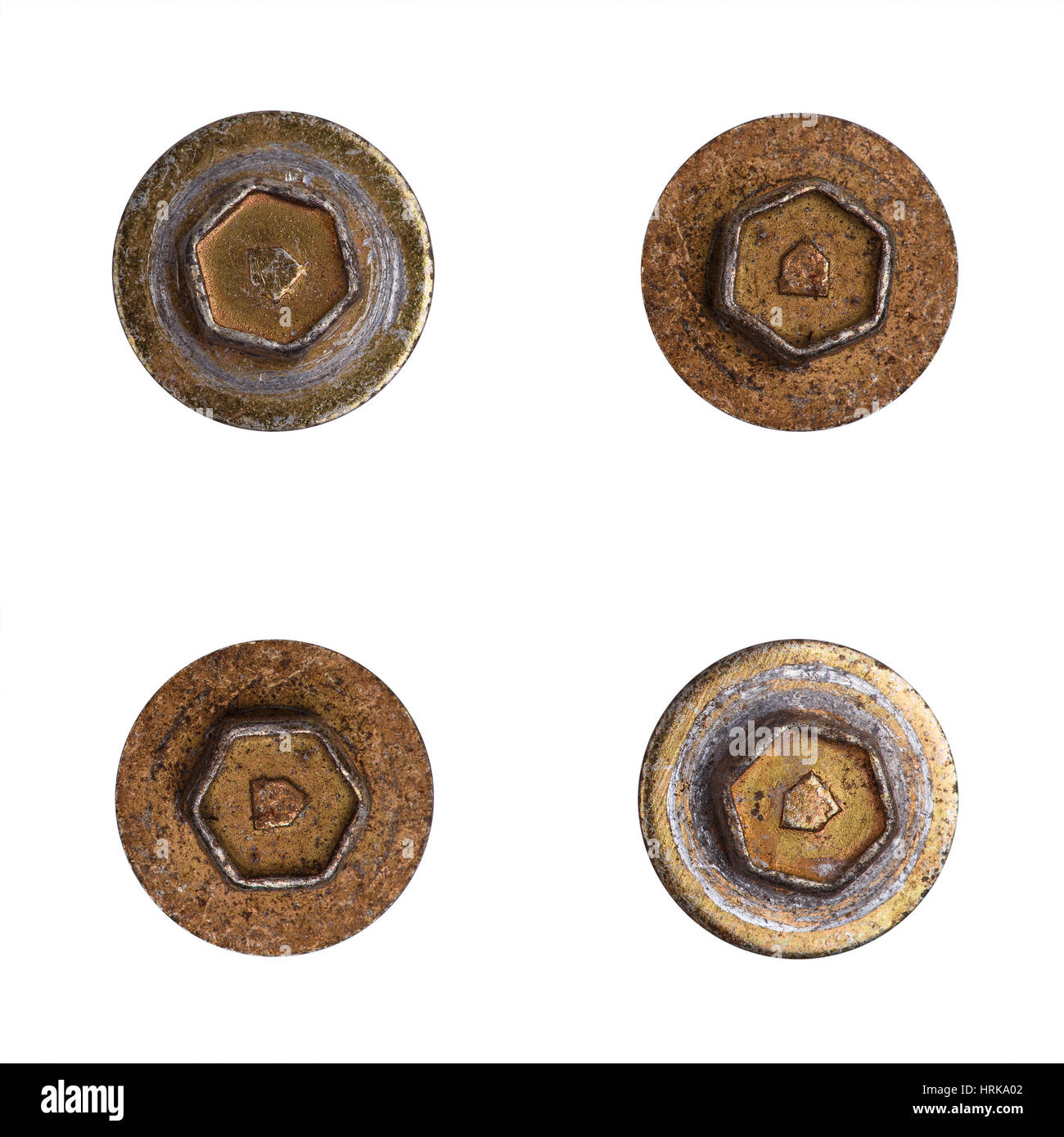 Four old screw heads isolated on white background. Screw heads with ...