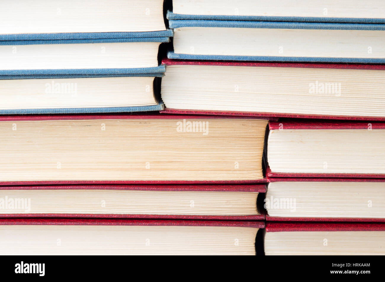 pile of old books stacked on top of each other Stock Photo - Alamy