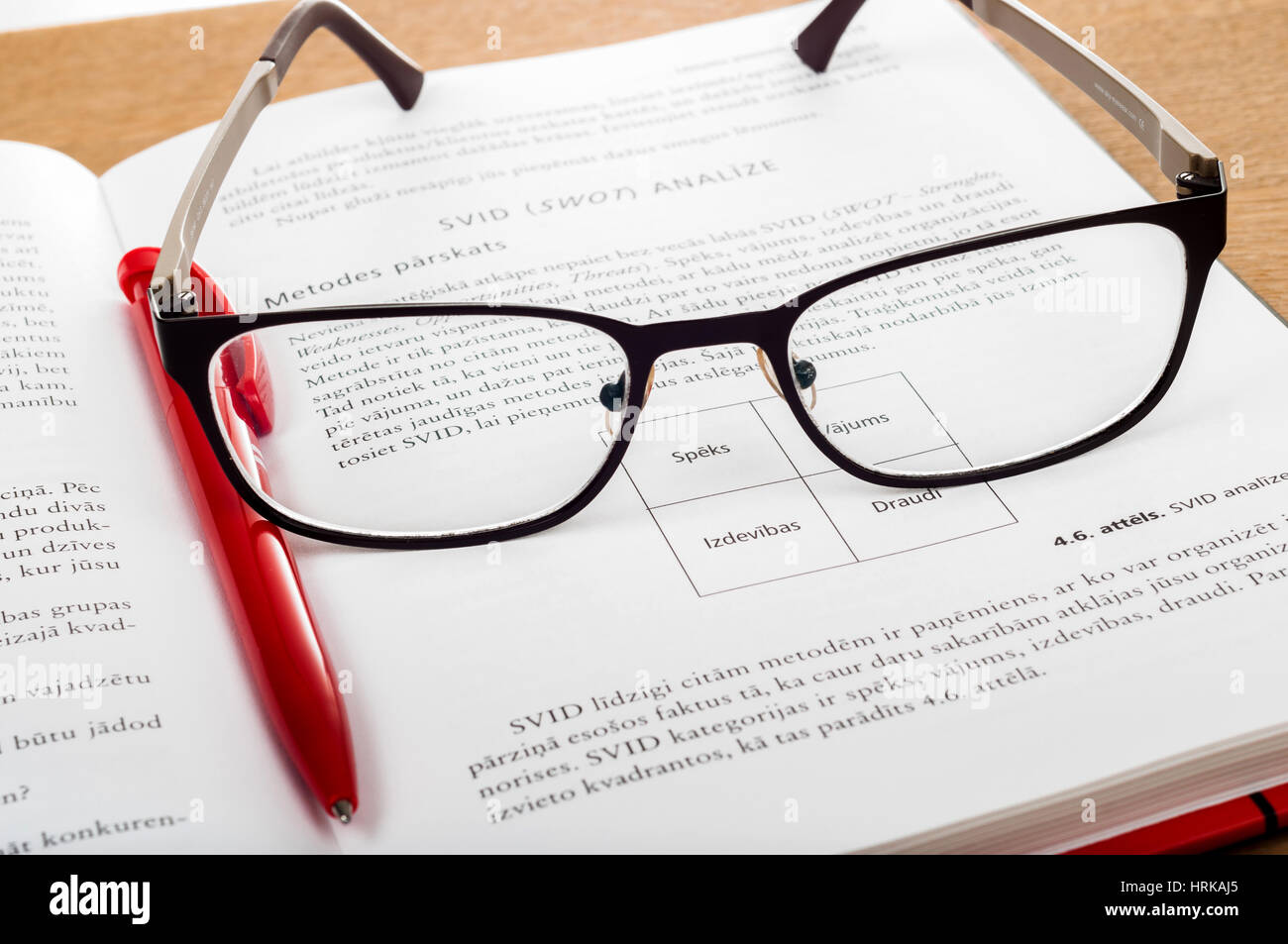 Open book on table spectacles hi-res stock photography and images - Alamy