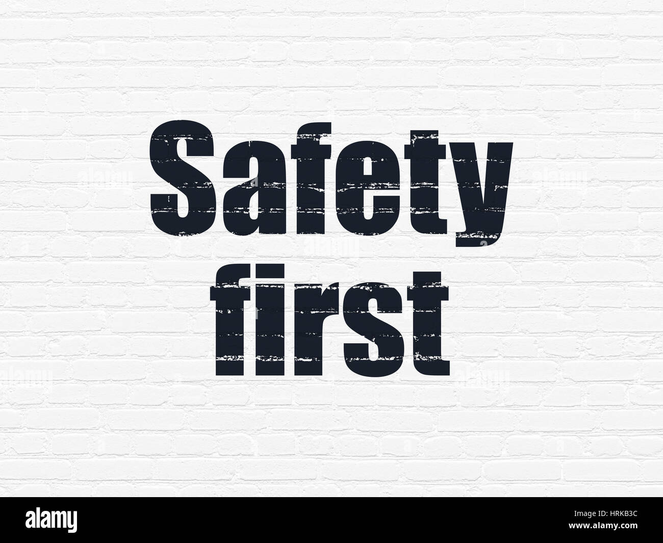 Safety concept: Safety First on wall background Stock Photo - Alamy