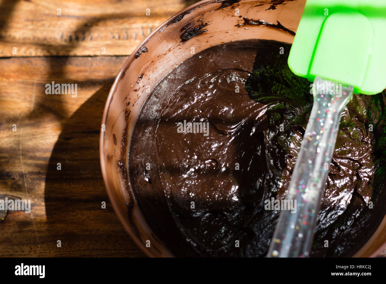 Chocolate Ganache and Spatula on a wood background Stock Photo - Alamy