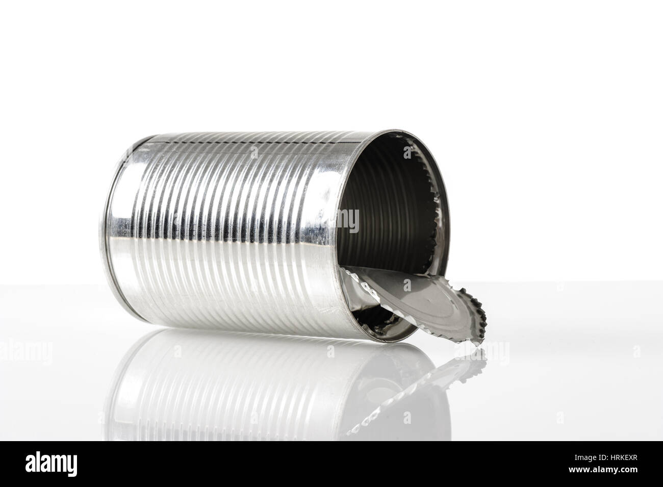 closeup opened tin isolated on white background Stock Photo - Alamy