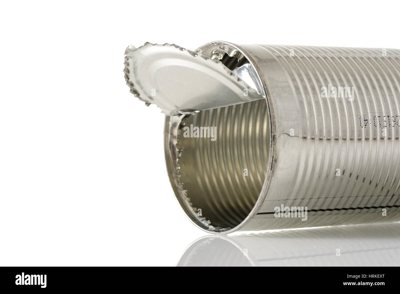 closeup opened tin isolated on white background Stock Photo - Alamy