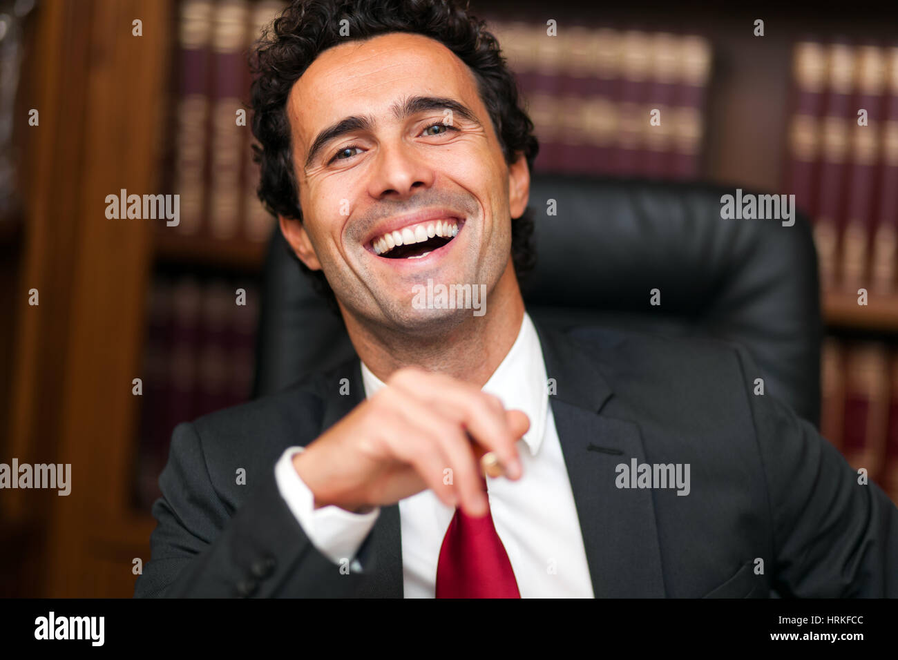 Lawyer portrait in his studio Stock Photo - Alamy