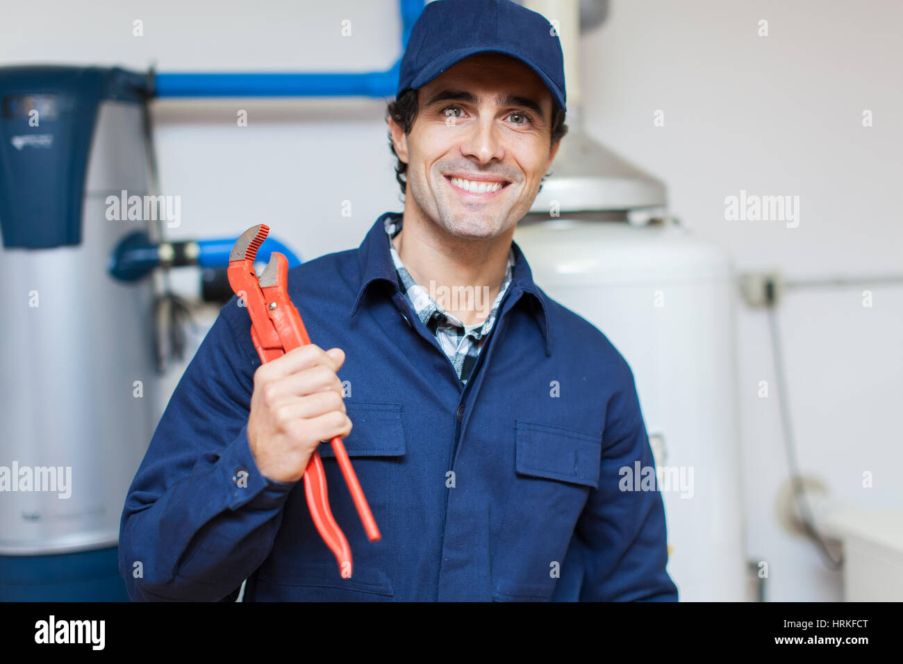 Plumber at work Stock Photo - Alamy