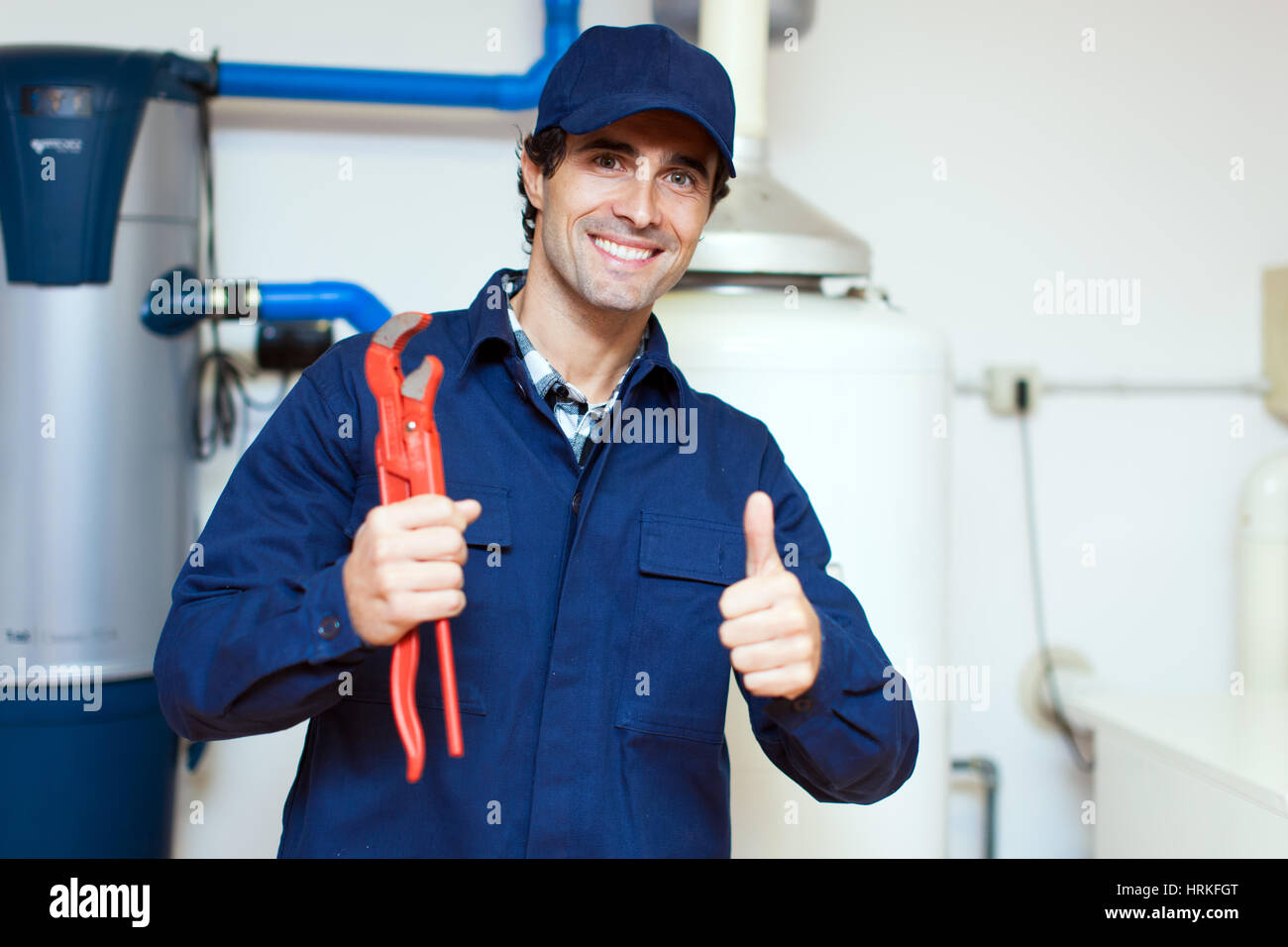 Plumber at work Stock Photo - Alamy