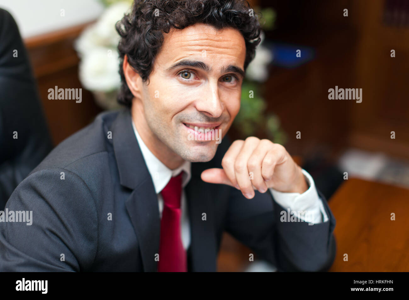 Lawyer portrait in his studio Stock Photo - Alamy