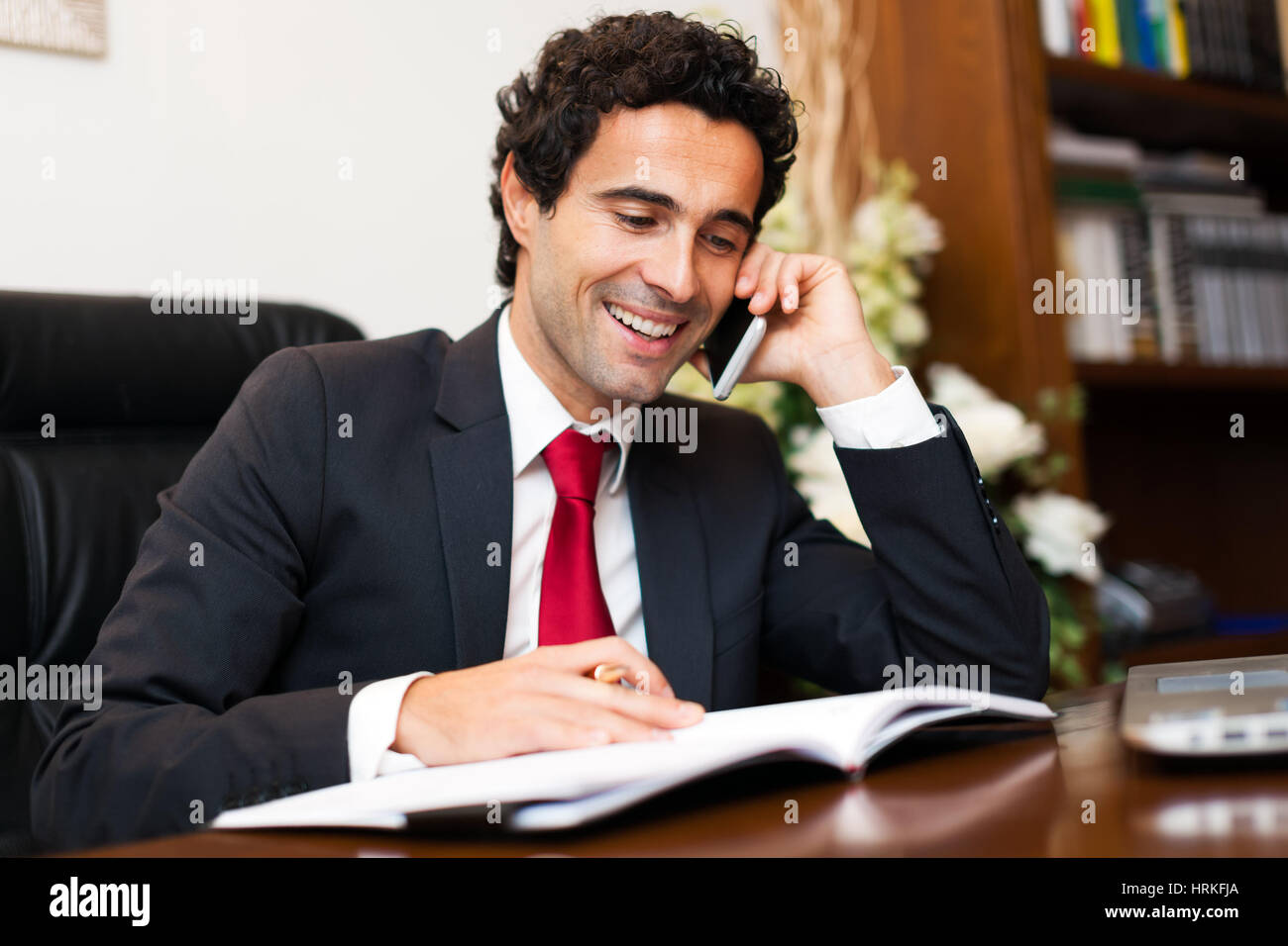 Portrait of a lawyer talking on the phone Stock Photo - Alamy