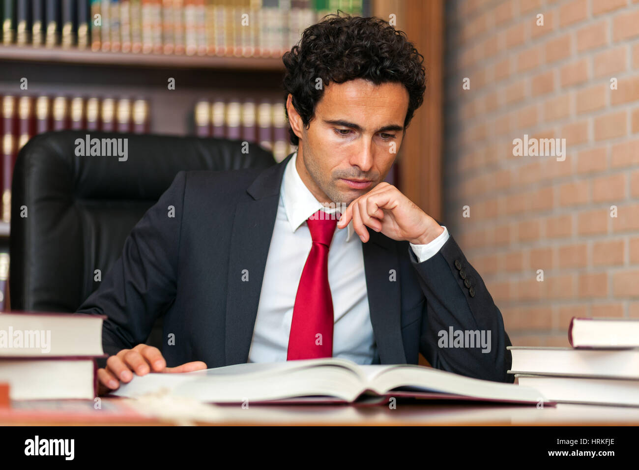 Confident lawyer in his studio Stock Photo - Alamy
