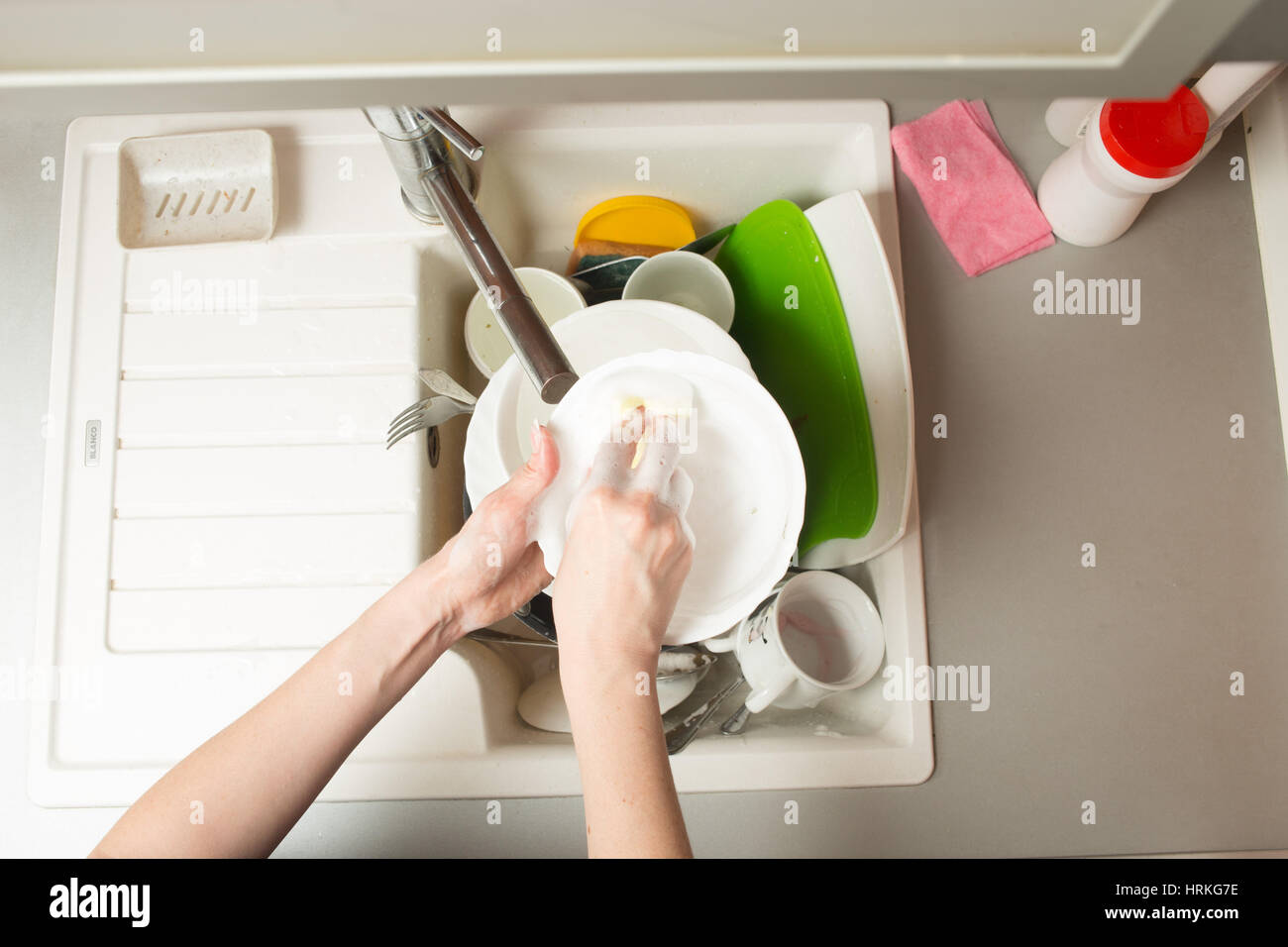 close up hands of Woman Washing Dishes in the kitchen Stock Photo - Alamy