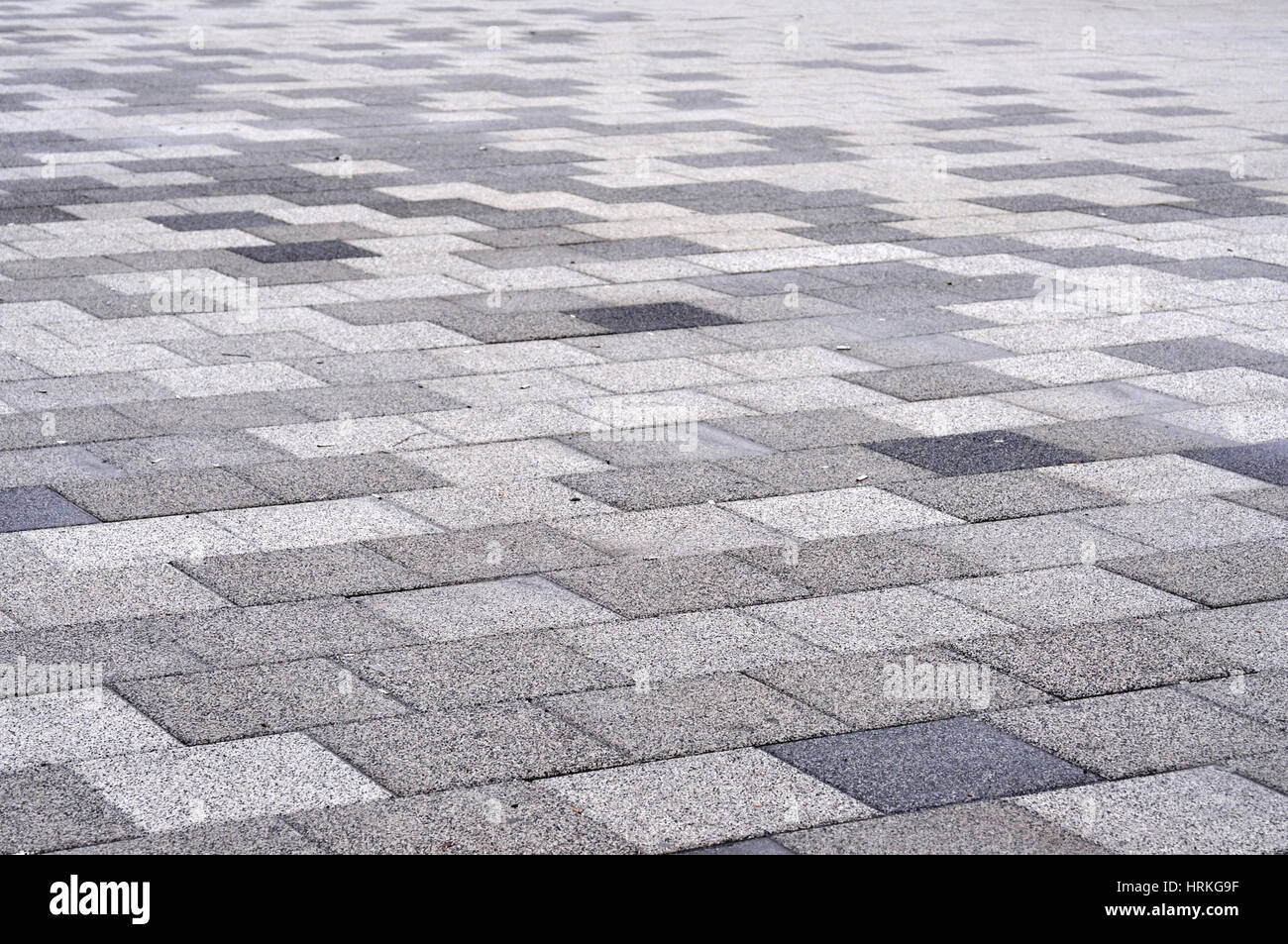 Tiled mosaic concrete pavement Stock Photo - Alamy