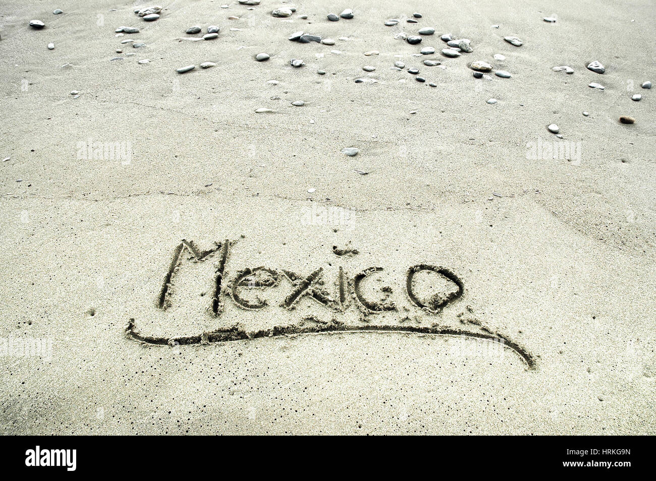 Mexico written in sand on the beach Stock Photo - Alamy