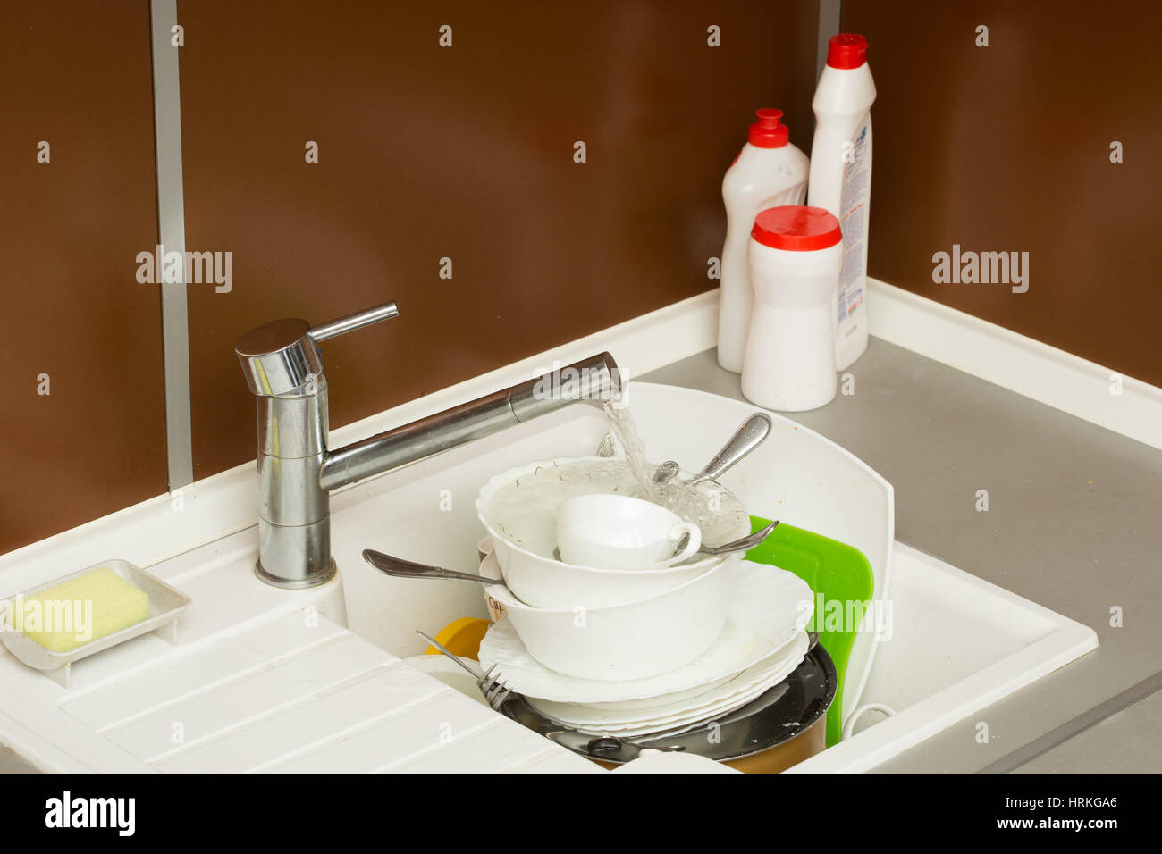 close up hands of Woman Washing Dishes in the kitchen Stock Photo - Alamy