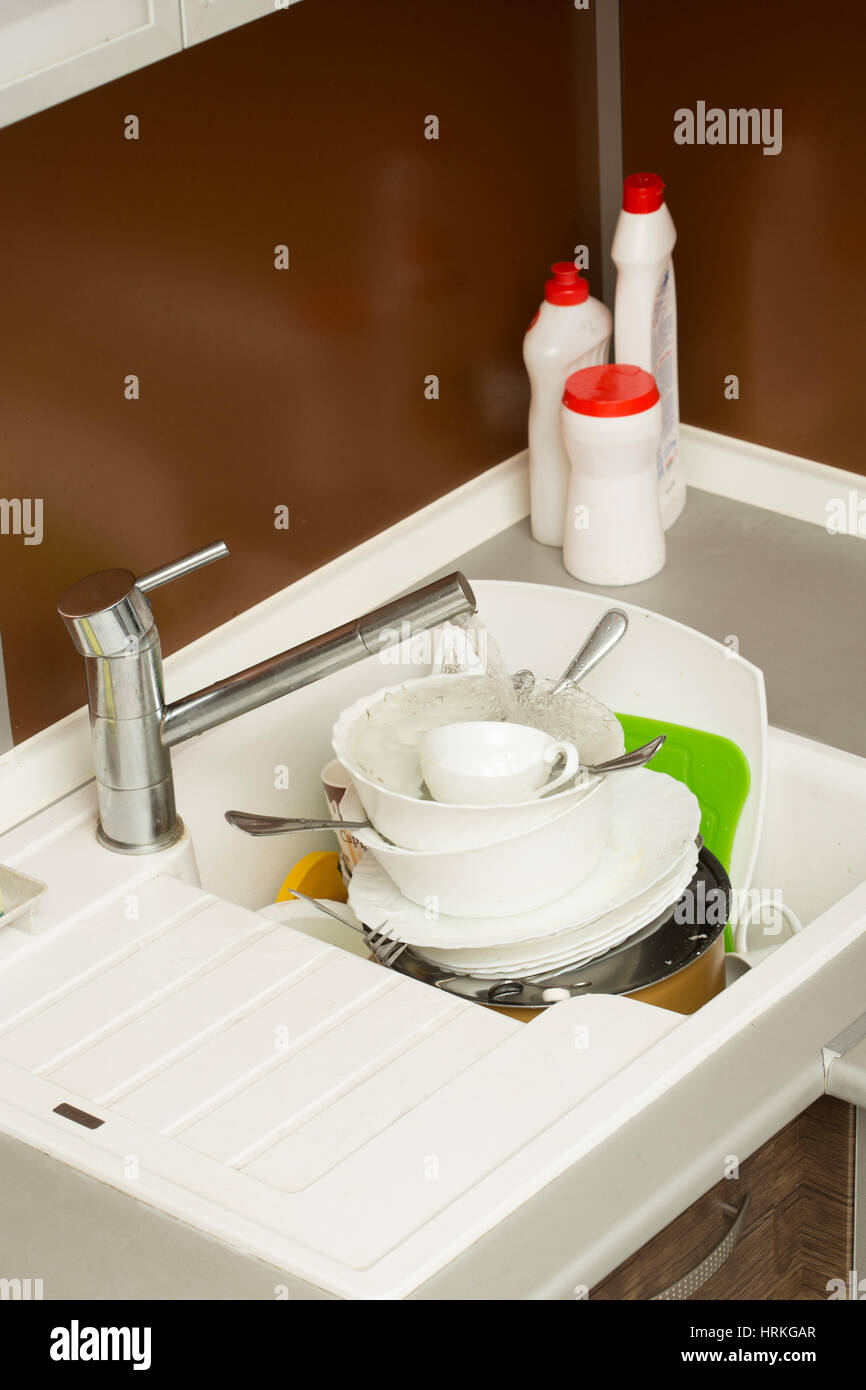 close up hands of Woman Washing Dishes in the kitchen Stock Photo - Alamy