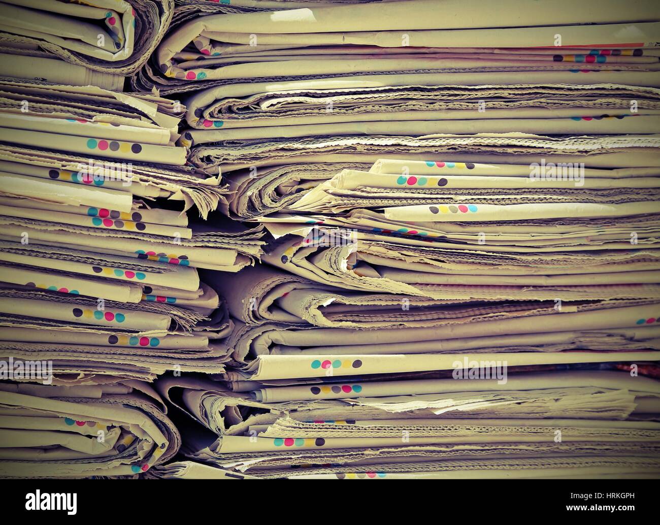 piles of paper used and already read newspapers ready for the paper ...