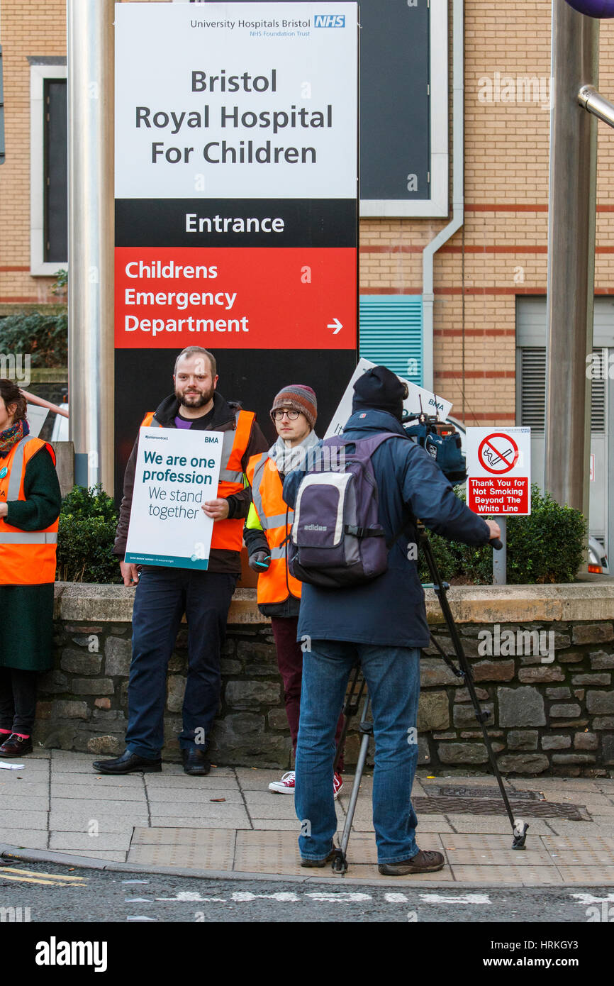 NHS protesters carrying placards supporting the Junior Doctors strike ...