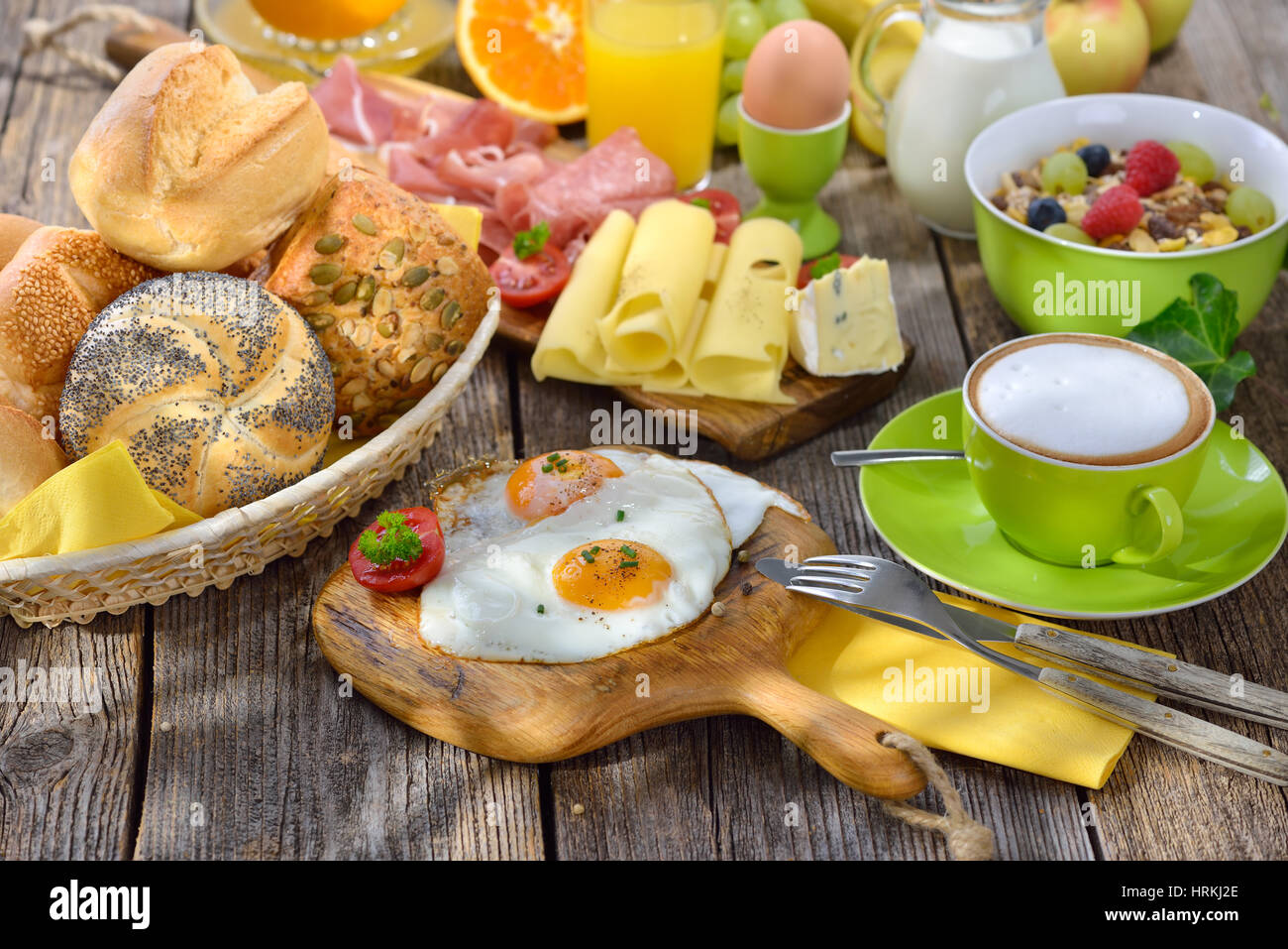 Outside served luxuriant breakfast with fried eggs a wide selection of ...