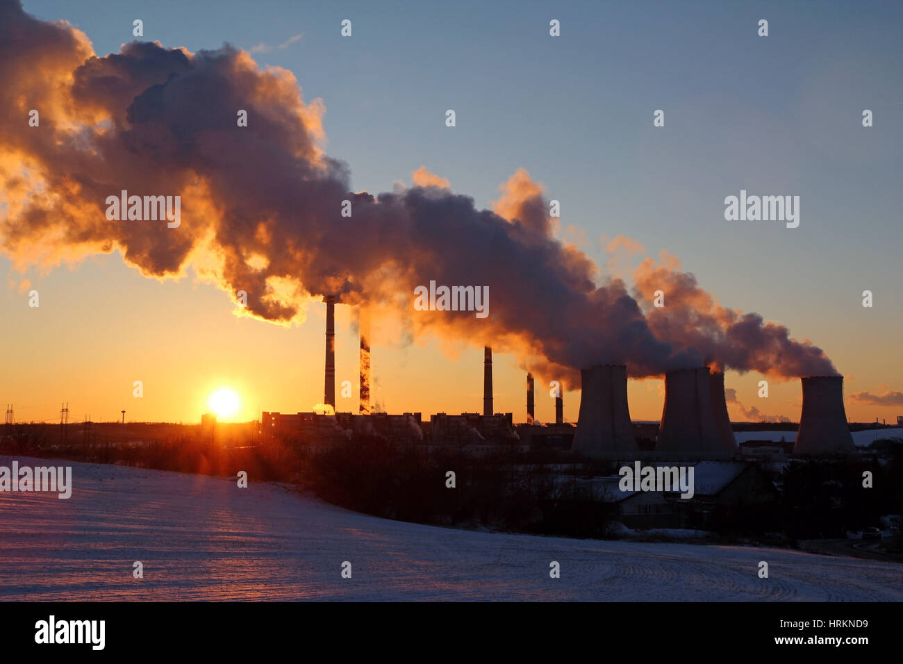 Silhouette of industrial factory at sunset hi-res stock photography and ...