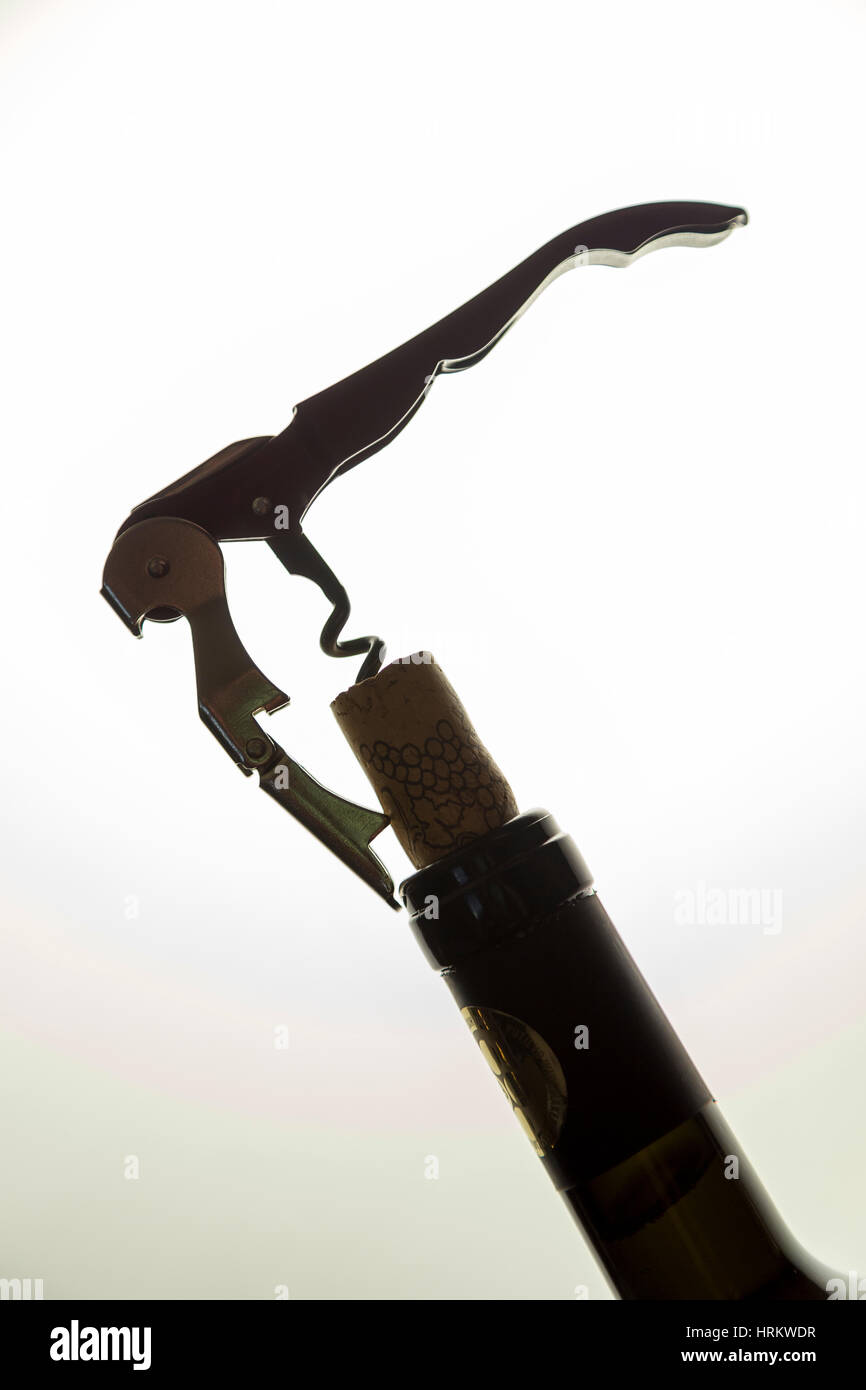 Opening a bottle of wine with cork Stock Photo - Alamy
