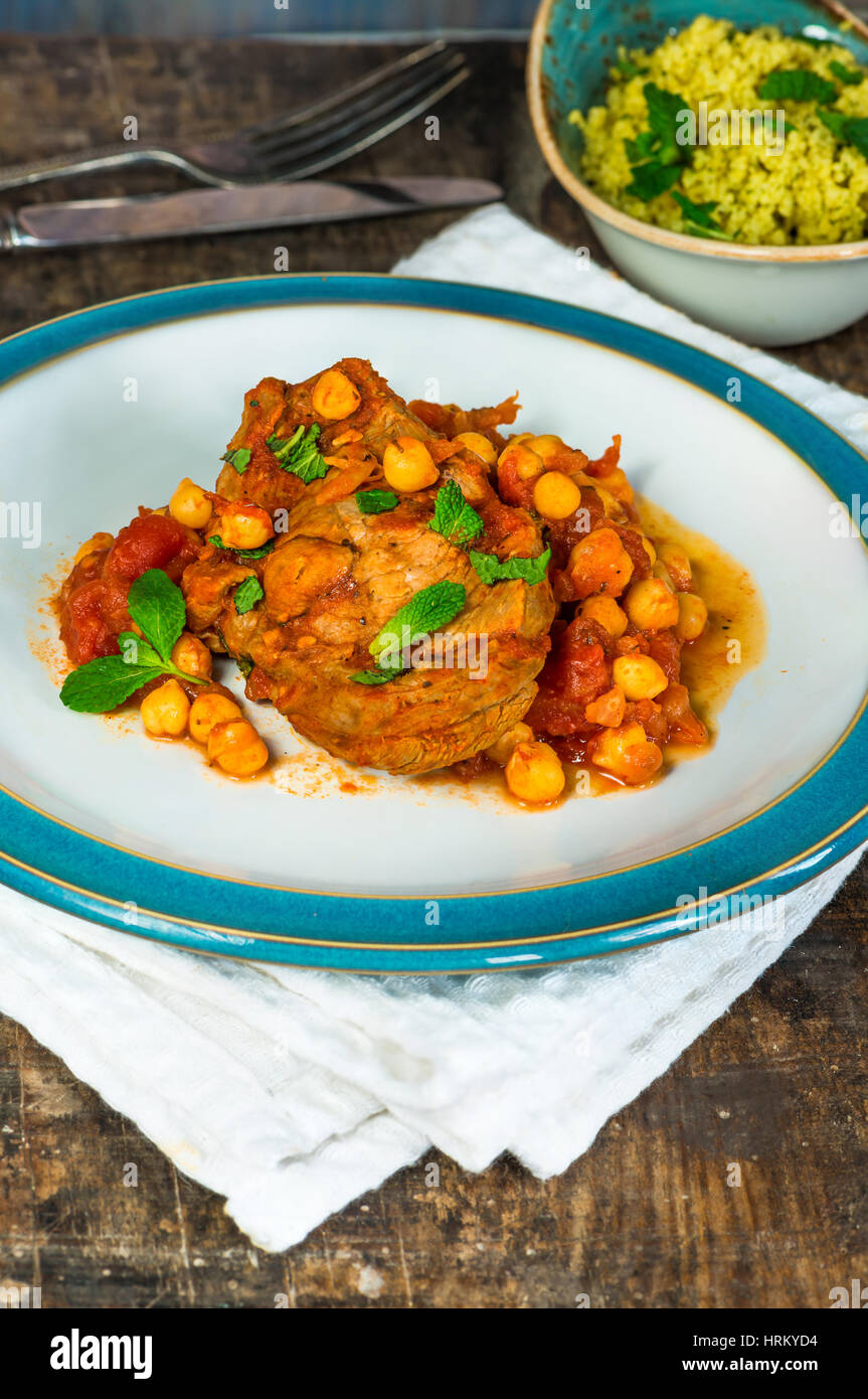 Homemade Harissa lamb chops with chickpeas and minted couscous Stock ...