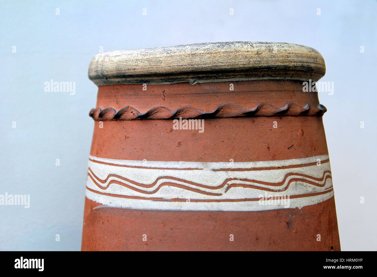 The top of a Fareham Red chimney pot with distinctive white decoration ...