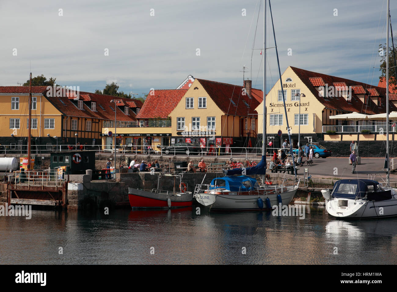 Fishing boats moored in the harbour at Svaneke, a small town on the ...