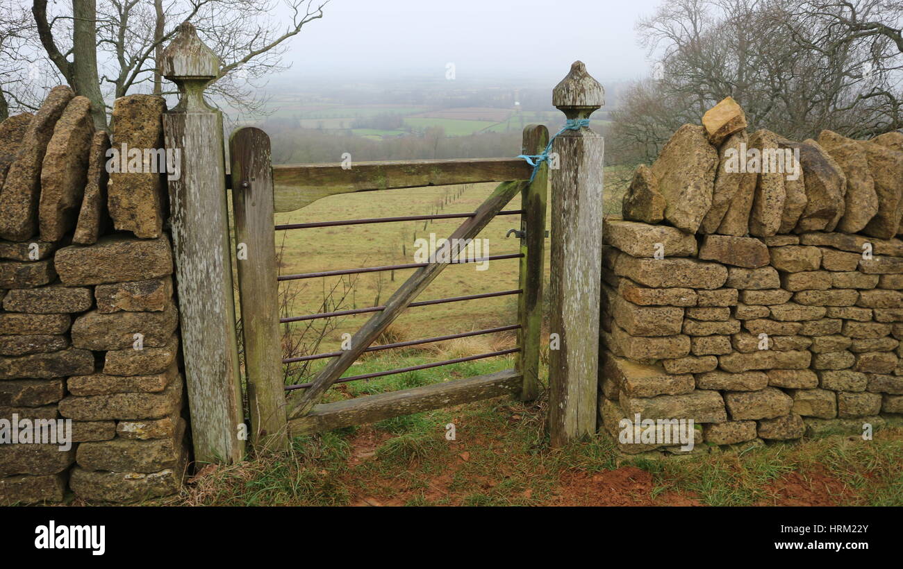 Small wooden gate with dry stone wall, close up, Cotswold, England,UK ...