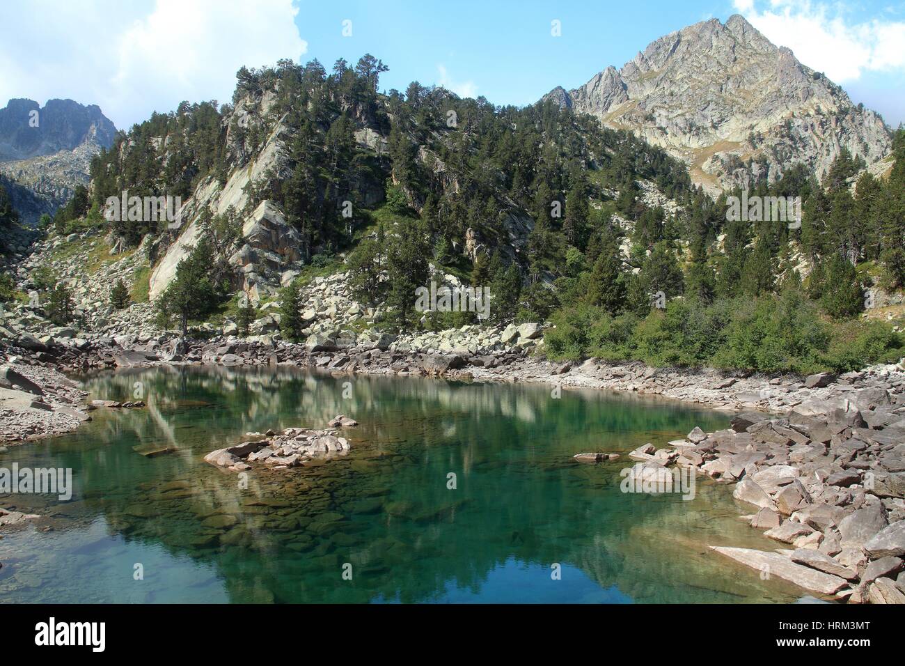 Small lake before ascending to lake Gerber. National Park Aigüestortes ...